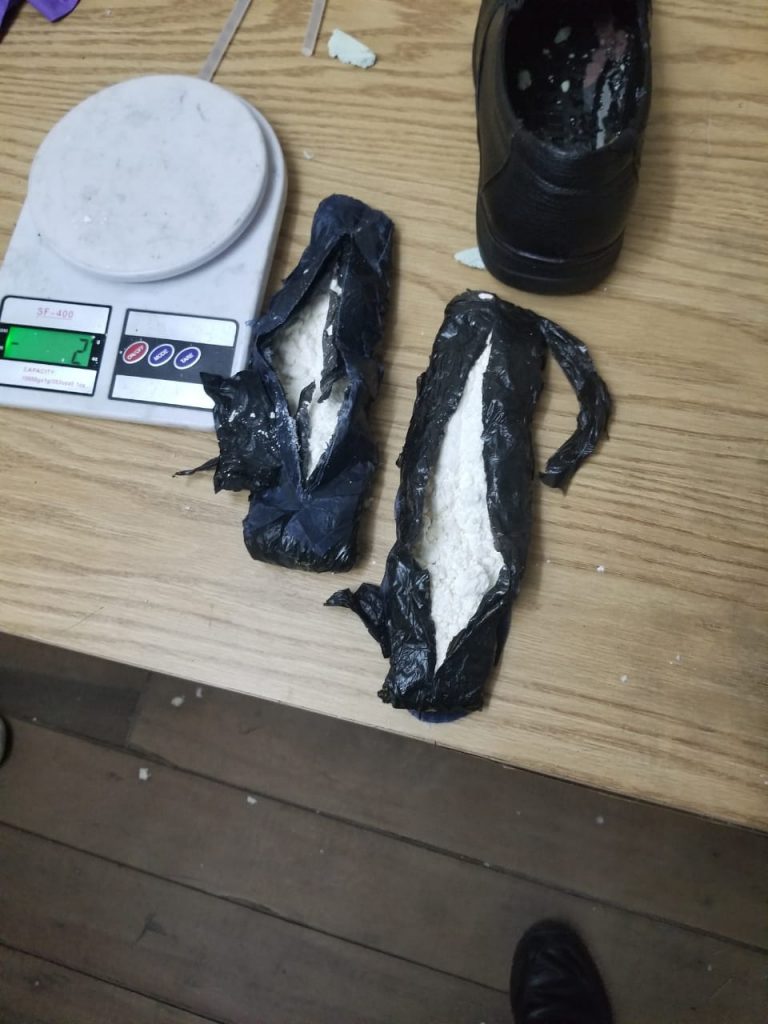 Senior citizen remanded for cocaine in shoes - News Room Guyana